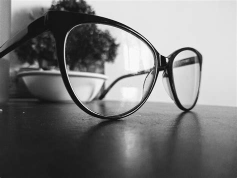 Premium Photo Close Up Of Eyeglasses On Table