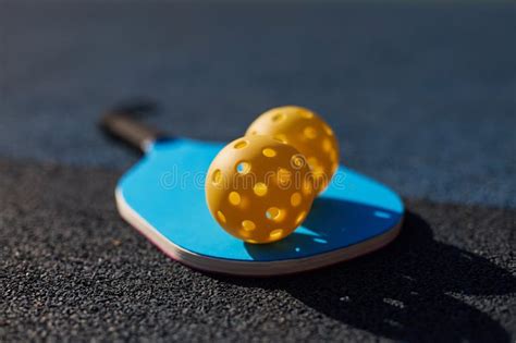 Pickleball Racket And Balls On Court Stock Image Image Of Pickleball Game 291759383