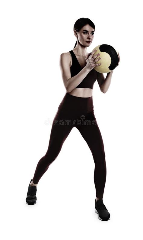 Athletic Woman Doing Exercise With Medicine Ball Isolated On White