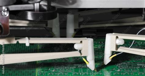 Needles Touch The Microcircuit In Machine For Automatic Testing Of Electronic Boards Process Of