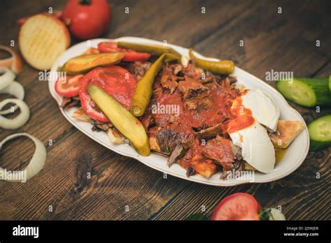 Turkish National Food Iskender Or Iskender Kebab With Yogurt And Herbs