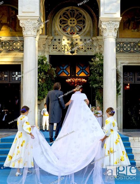 Miss Nina Flohr And Thomas Flohr Arrive At The Metropolitan Cathedral Of Athens On October 23