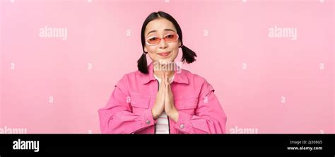 Please Cute Asian Girl Asking Favour Begging Standing Against Studio
