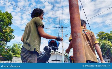 Two Technicians Doing Internet Cabling Editorial Image Image Of