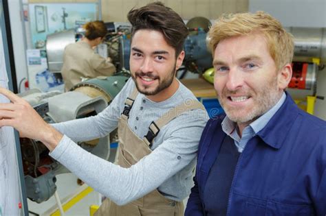 Two Men Working At Factory Stock Image Image Of Valve 275397429