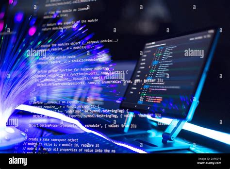 Program Code On A Computer Monitor With Fiber Optic Background Internet And Technology Concept