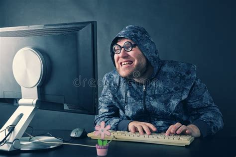 Man Sitting At Desk Looking On Computer Screen Stock Image Image Of Indoor Grey 39991369