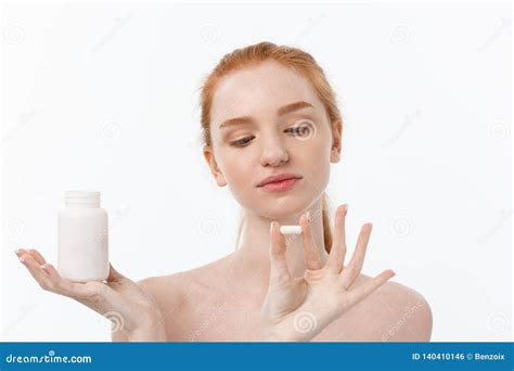 Beautiful Smiling Girl Taking Medication Holding Bottle With Pills