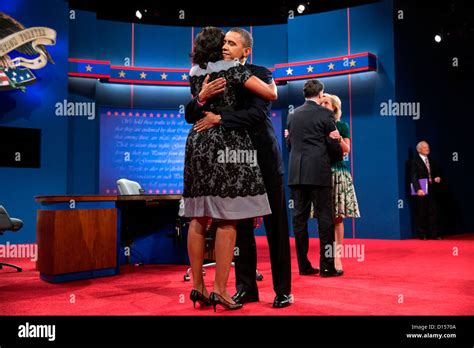 Us President Barack Obama Hugs First Lady Michelle Obama Following