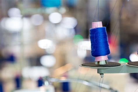 Spools Of Blue Threads On Sewing Machine Factory Stock Image Image