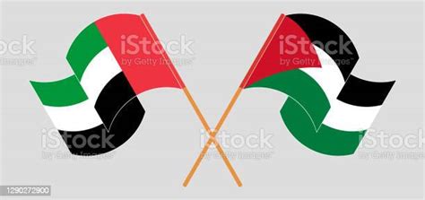 팔레스타인과 아랍 에미리트의 교차 하고 흔들리는 깃발 Palestine Liberation Organization에 대한 스톡