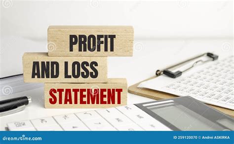 Business Photo Shows Profit And Loss Statement Words On Wooden Blocks