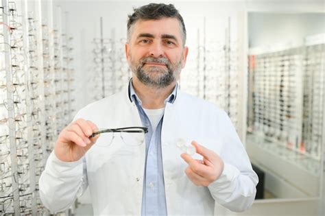 Premium Photo Eye Doctor Choosing Between Eyeglasses And Lenses