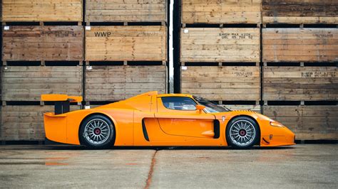 Download Supercar Orange Car Car Maserati Vehicle Maserati Mc12 Hd Wallpaper