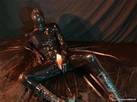 Solo Girl Unzips Head To Toe Latex Clothing In Order To Masturbate With