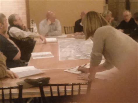 One Of The Three Tables With Maps And Flip Charts For Discussion