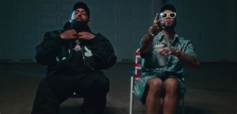 Anuel Aa Sits Atop His Gurkha Civ Wearing A Stay Rich Snapback And Grey