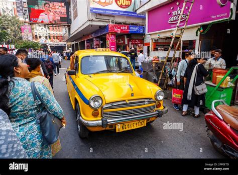 Typical Vintage Ambassador Yellow Cab Taxi In The Street In The New
