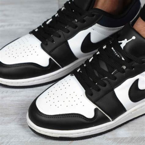 نایک ایر جردن نیم ساق سفید سرمه ای Nike Air Jordan Low 1 فروشگاه