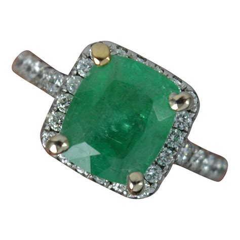 Vintage Emerald And Diamond Cluster Style Engagement Ring 18 Carat