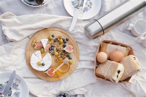 Picnic On The Lake With Fresh Eggs Cheese And Sandwiches Stock Image