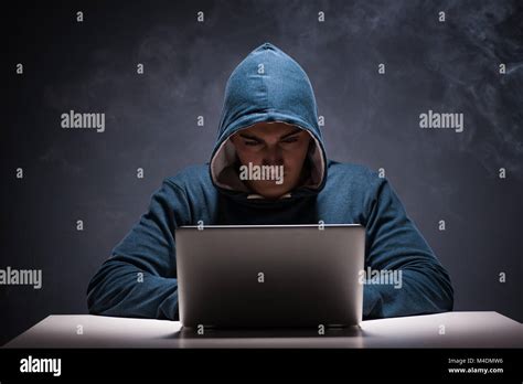 The Computer Hacker Working In Dark Room Stock Photo Alamy