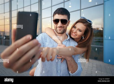 Young Happy Fashion Couple In Casual Clothing With Dark Sungklasses
