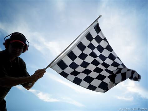Man Waving Checkered Flag