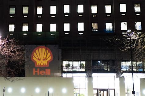 Guerilla Protest Against Shell Profits As South London Lit Up With