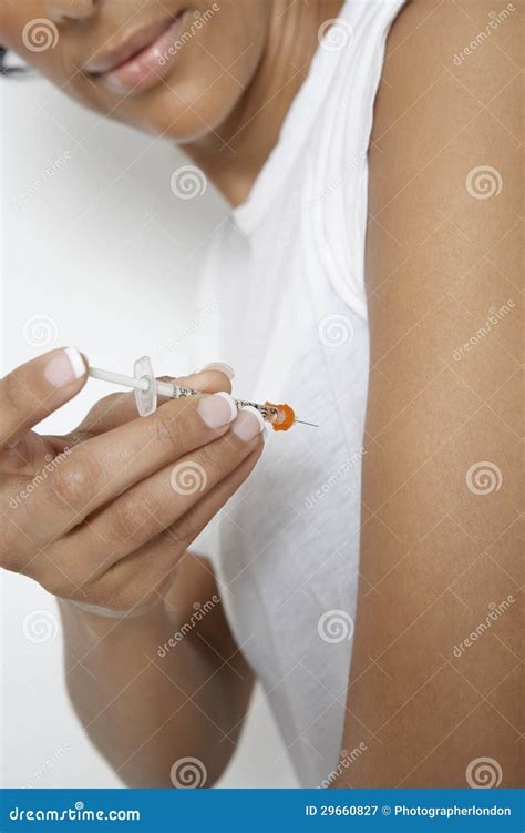Woman Injecting Insulin Using Syringe Stock Image