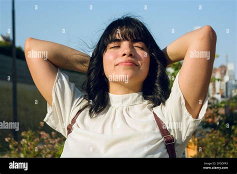 Break From Long Class At University Young Woman Outdoors Sitting With