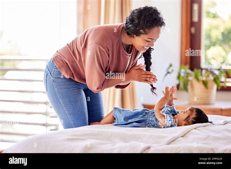 Mother Playing Baby Daughter Bed Room Fun Bonding Cute Stock Photo Alamy