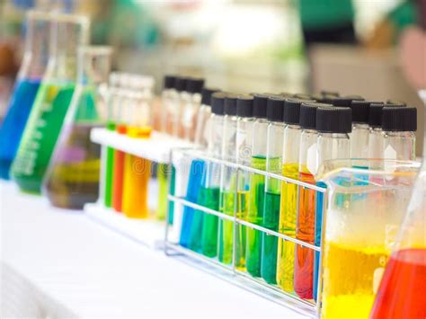 Colorful Chemical Substance In The Clear Test Tube And Flask Stock