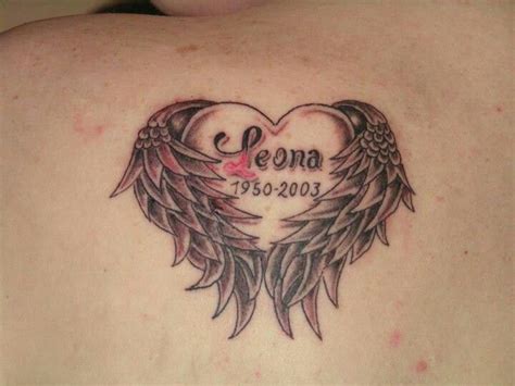 Memorial Tattoo Love The Placement And The Name In Between The Wings