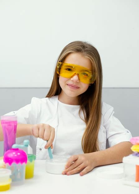 Premium Photo Girl Scientist Having Fun Making Slime In The Laboratory