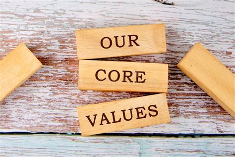 Concept Words Our Core Values Symbol On Wooden Blocks On Old Boards