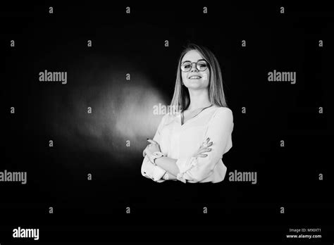 Studio Portrait Of Blonde Businesswoman In Glasses White Blouse And