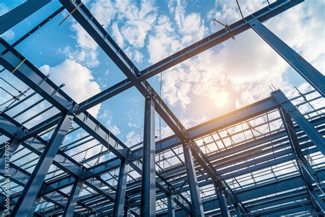 Steel Structure Framework Against Sky Upward View Of A Steel Structure