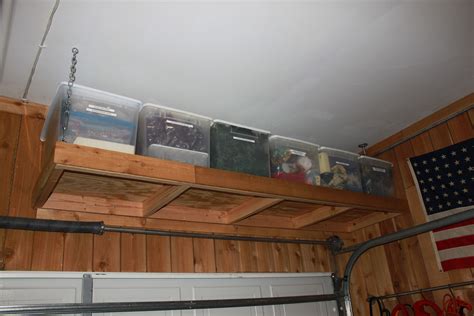 Shelves Over The Garage Door Diy Garage Shelves Diy Overhead Garage