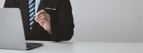 Premium Photo Businessman Man With Laptop He Uses The Laptop To View Business Documents And