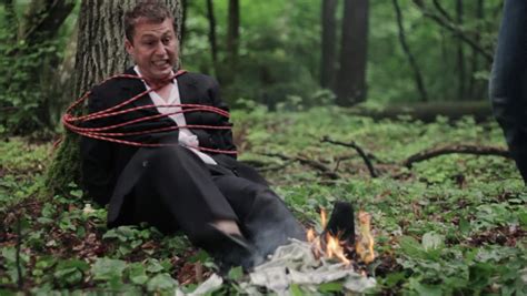 Businessman Tied Tree Forest Frantically Tries Stock Footage Video 100