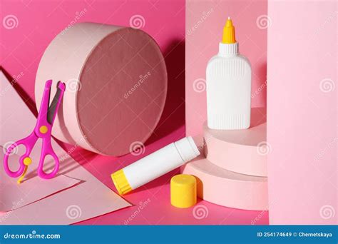 Composition With Glue Paper And Scissors On Pink Background Stock