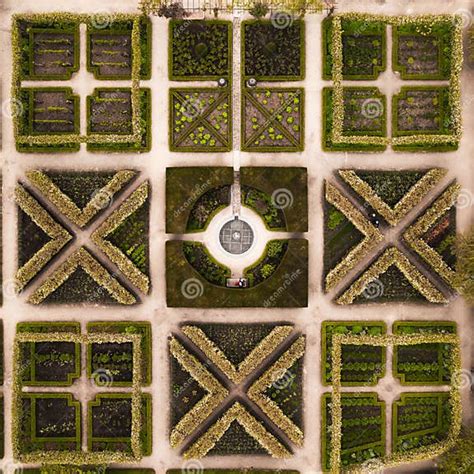 Aerial View Directly Above A Formal Landscaped Garden With Square