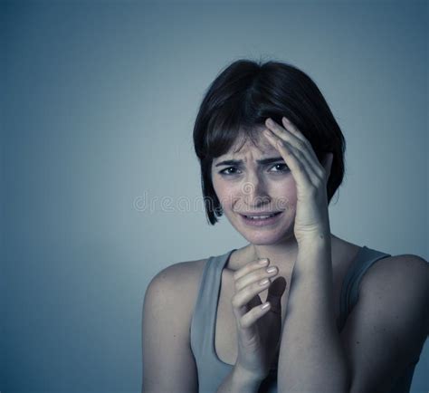 Portrait Of A Young Attractive Woman Looking Scared And Shockedhuman