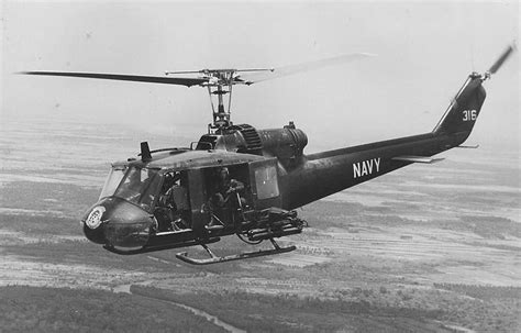 Bell UH 1 Huey Gunship With HA L 3 USN Over Vietnam R Helicopters