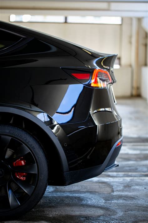 Tesla Now Trolls Toyota With Cybertruck Wrapped To Look Like Tundra