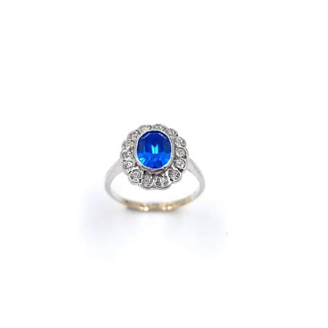 Star Lot A Pretty Blue Gemstone Cluster Ring Set In Nine Carat