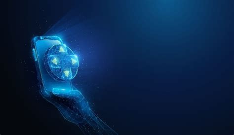 손에 있는 스마트폰의 로우 폴리 게임 컨트롤러 Dpad의 추상 그림 모바일 게임과 복고풍 게임 콘솔 에뮬레이션 개념을 묘사하는 파란색 기하학적 배경은 와이어프레임 메쉬로