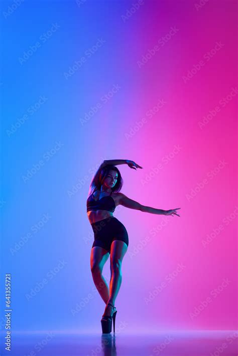 Beautiful Female Dancer Wearing Black And High Heels While Performing