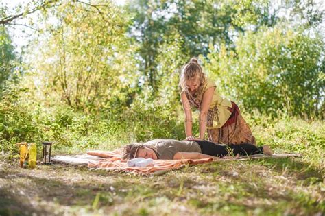 Girl Masseuse Provides A Thorough Massage Outside Stock Image Image